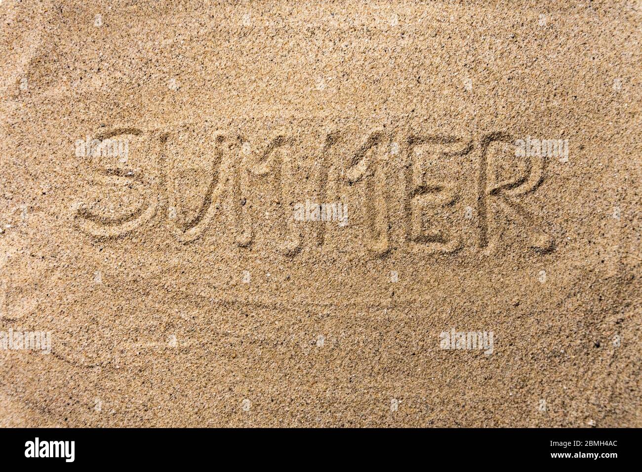Background with text "summer" written in the sand Stock Photo - Alamy