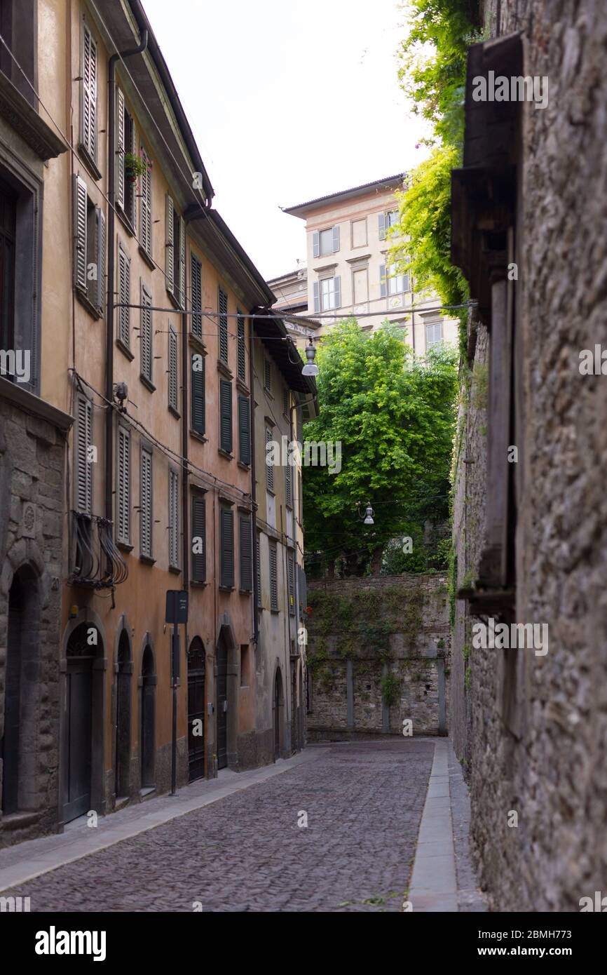 Traditional narrow Italian street and no people in Bergamo historical ...