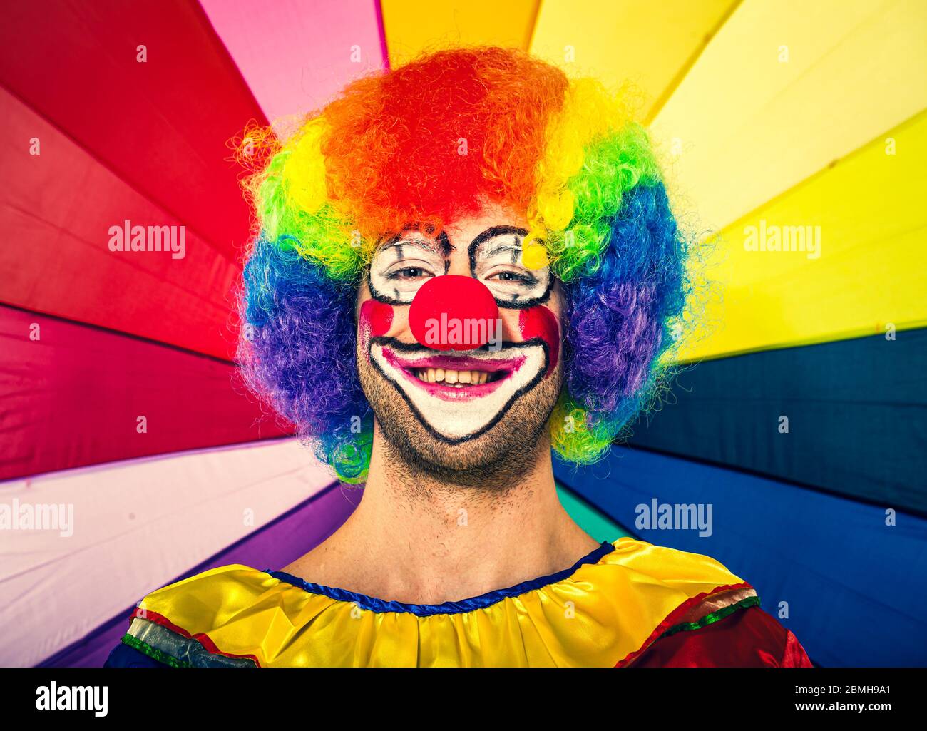 Colorful clown face Stock Photo - Alamy