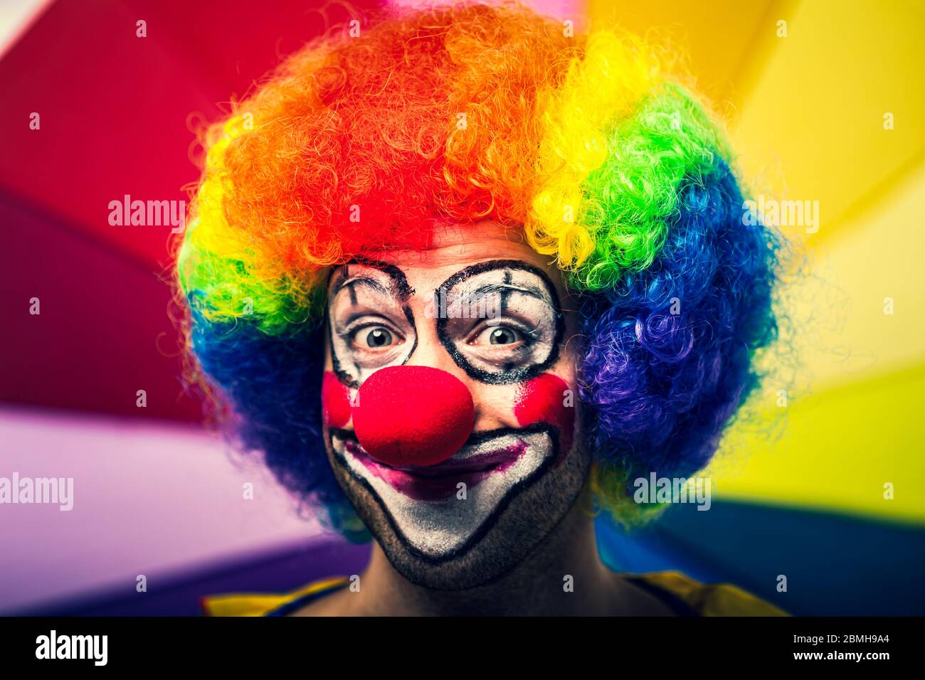 Colorful clown face Stock Photo - Alamy