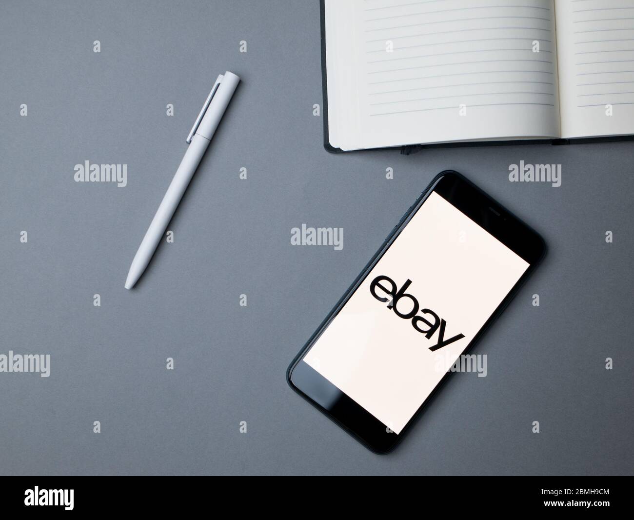 USA - May, 2020 Ebay Iphone Application Screen with pen and notebook on ...
