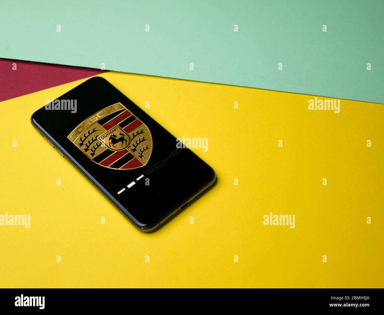 USA - May, 2020 Porsche Iphone Application Screen on colored paper ...