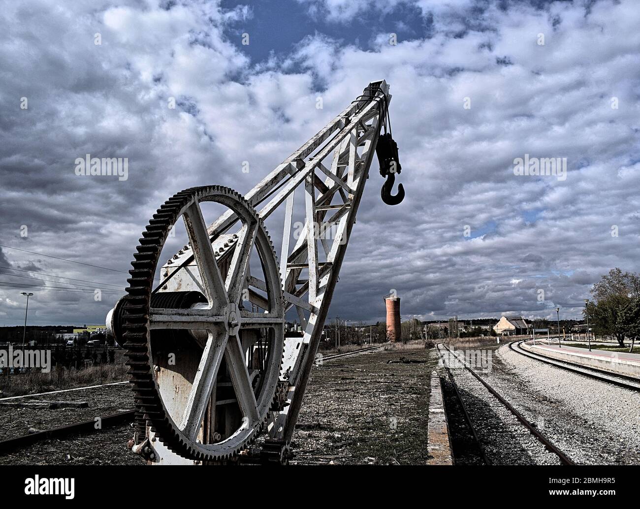 loading crane in a train station Stock Photo - Alamy