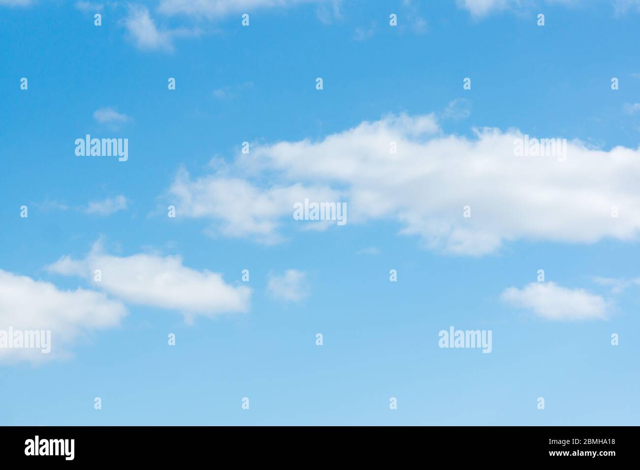 blue sky with flying white light clouds Stock Photo - Alamy