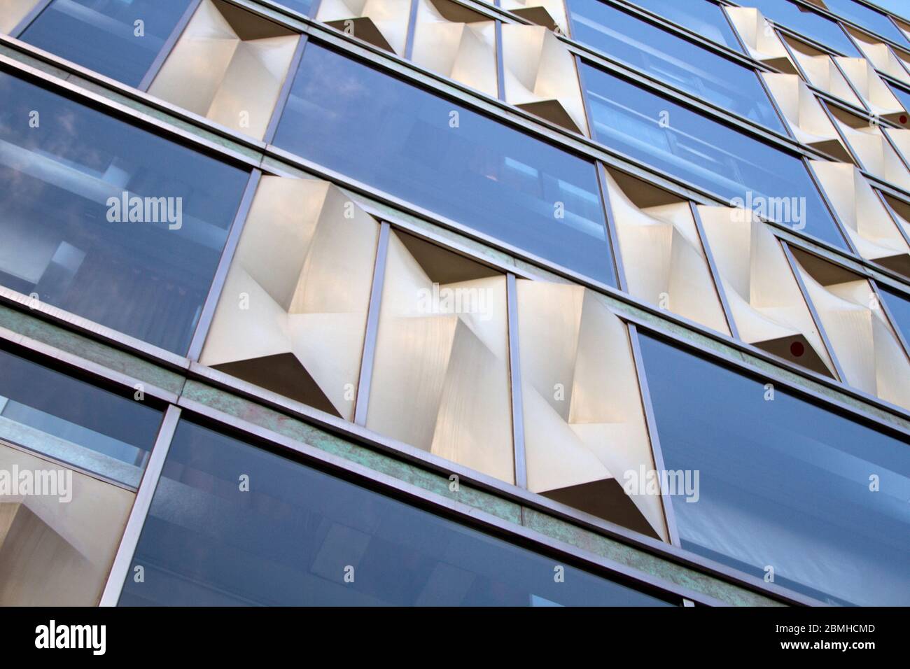 View of a diagonal glass facade Stock Photo - Alamy