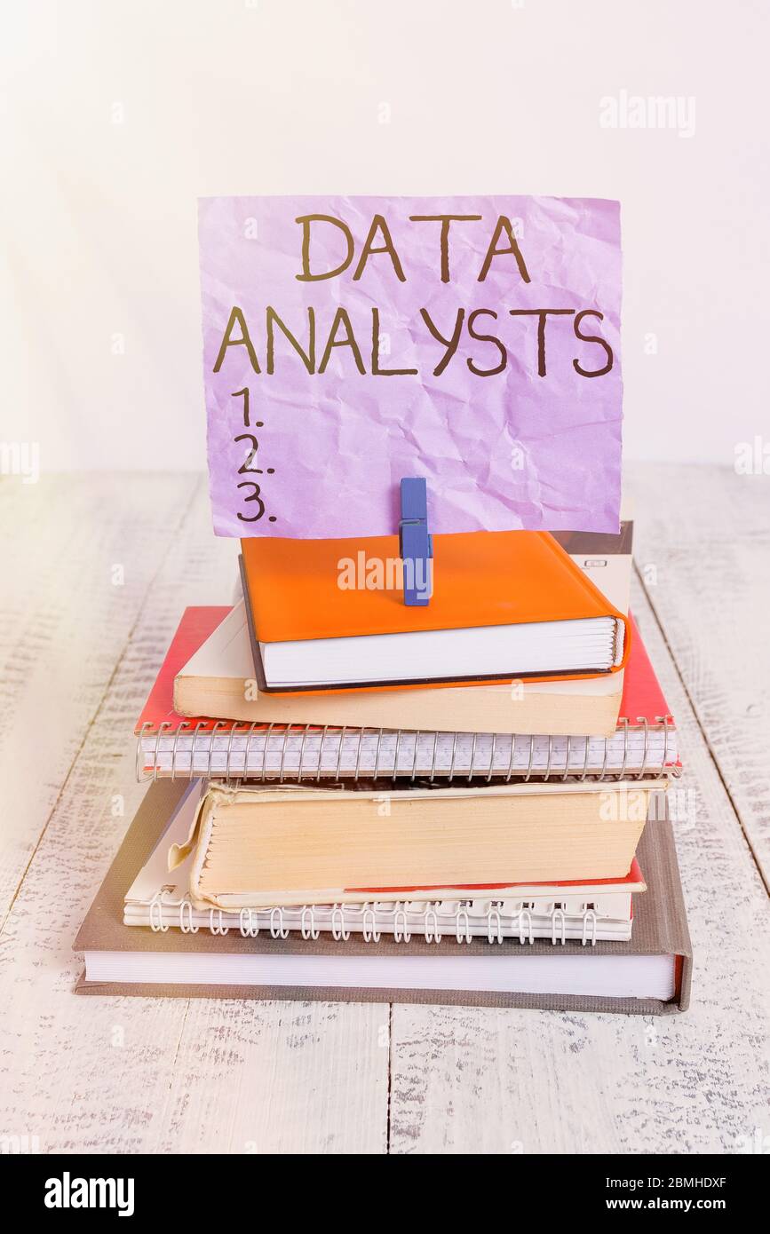 Handwriting text Data Analysts. Conceptual photo Programmer Design and Create Report Identifies ...
