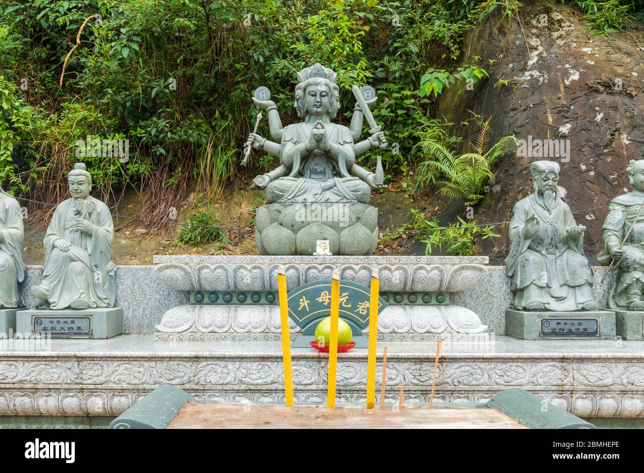 Seated statue with many arms at the buddhist Temple of Ten Thousand ...