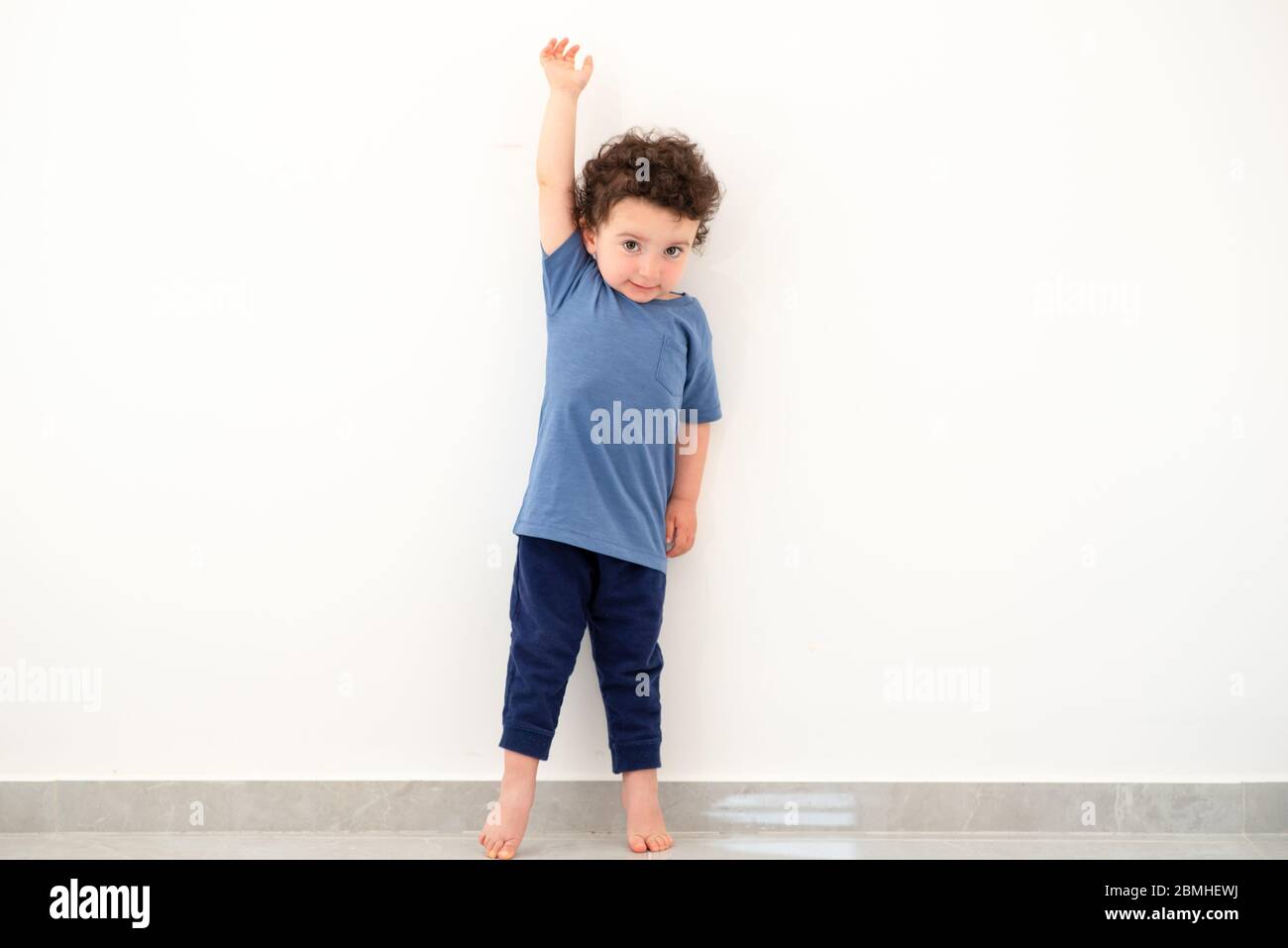 Boy height chart hi-res stock photography and images - Alamy