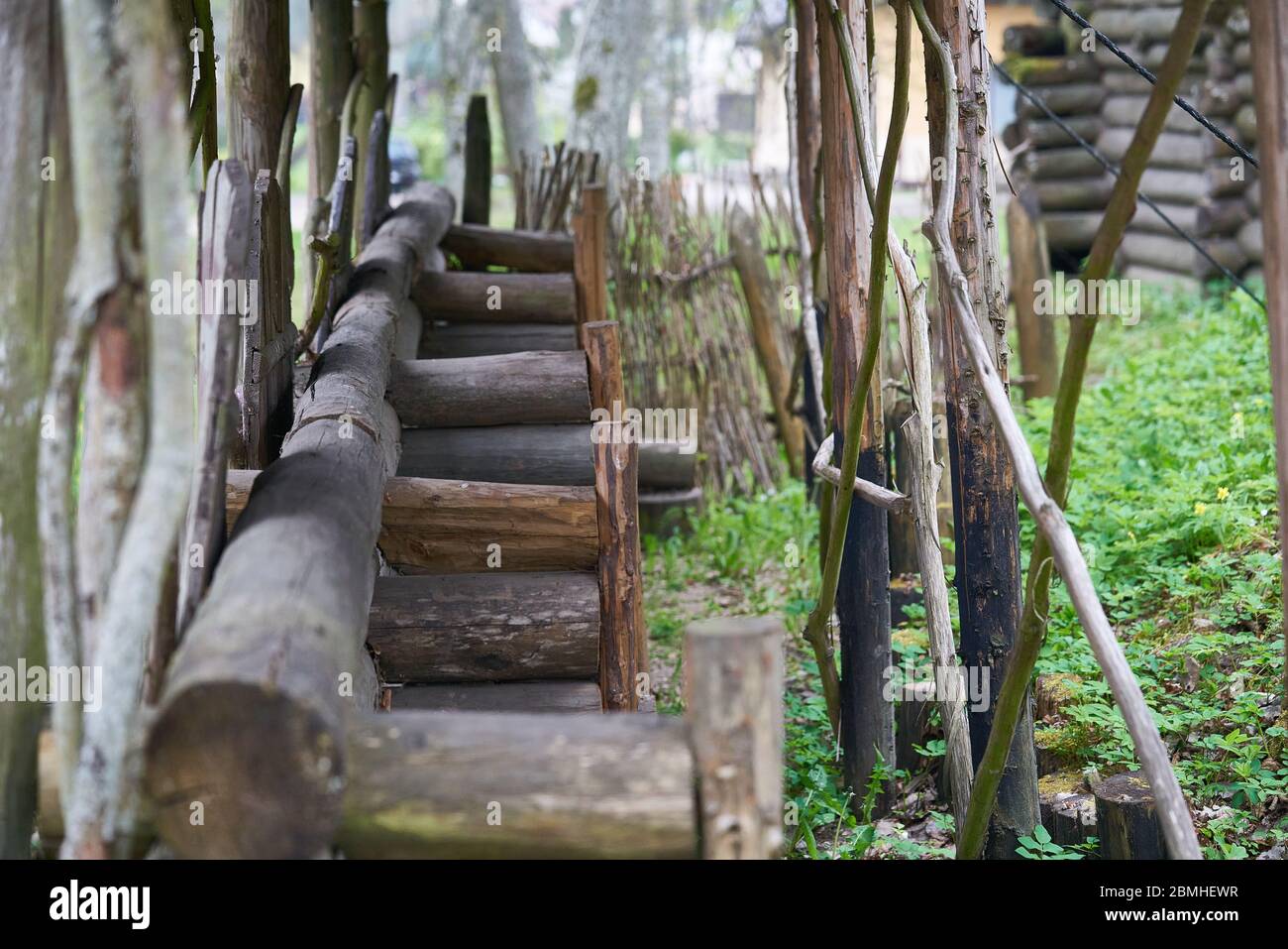Reconstructed ancient wooden fortification in the outdoor archeological ...