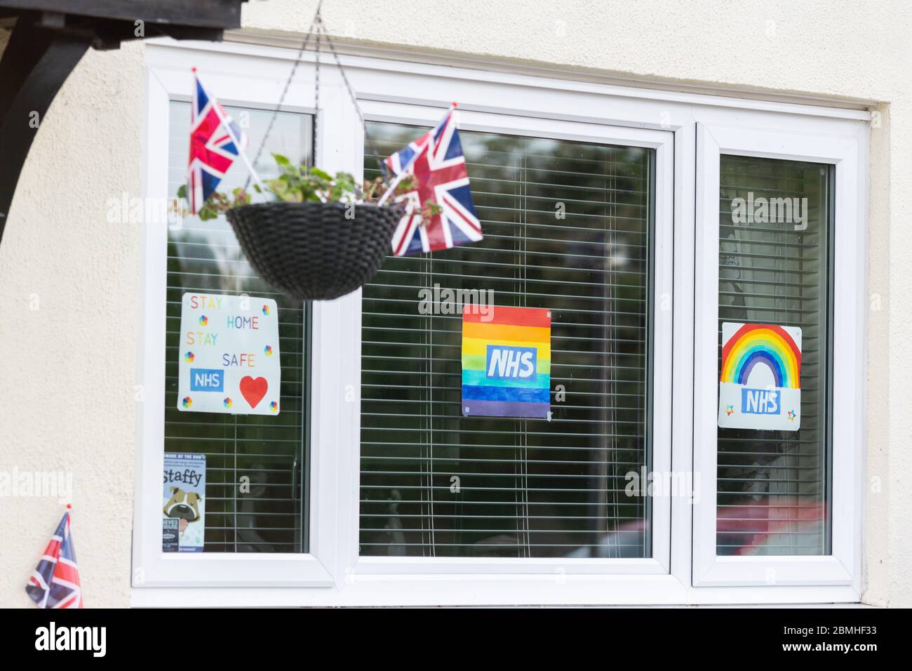 "Thank You NHS" rainbow sign in a house window. These are displayed ...