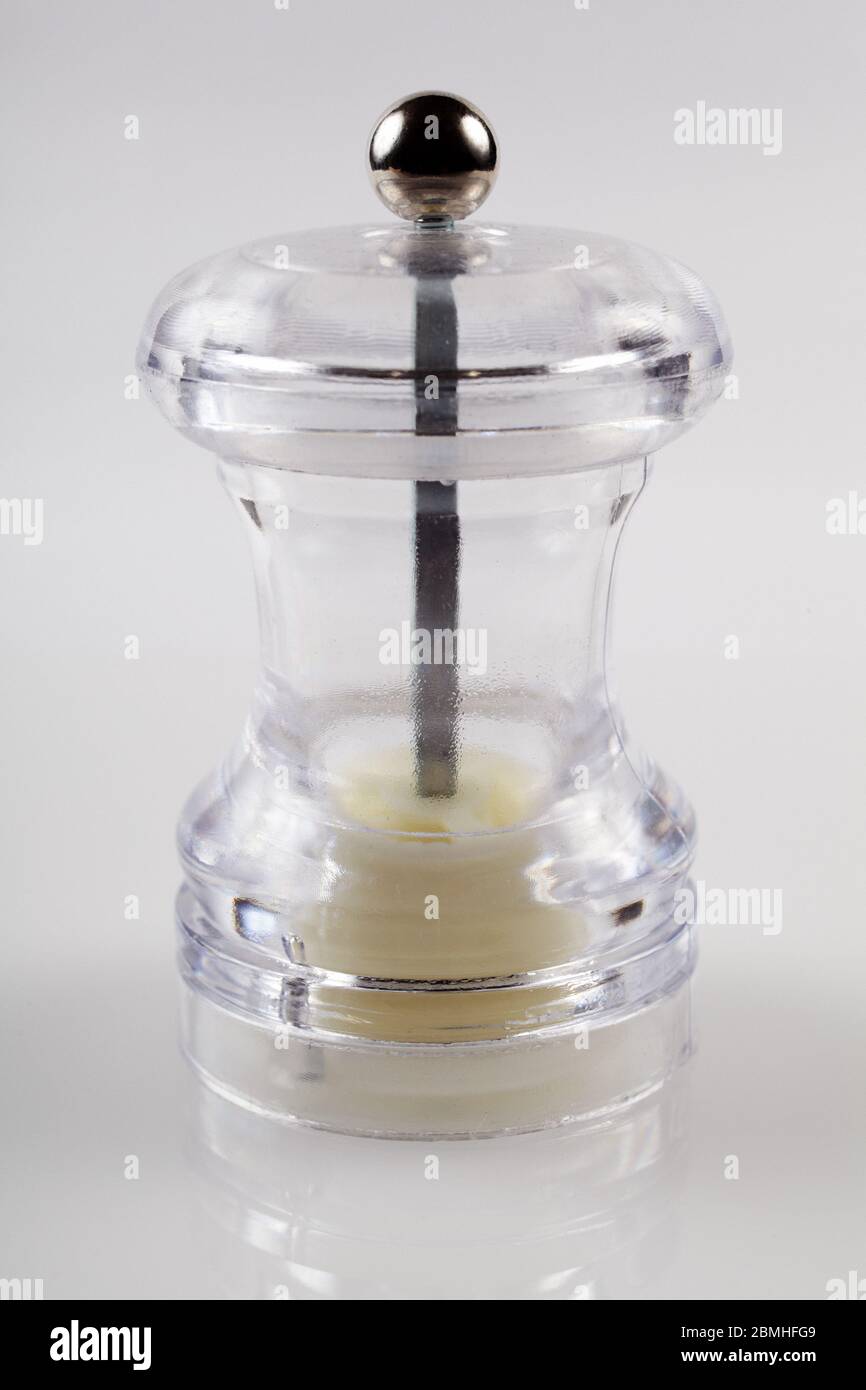 Empty mill for pepper, spices. White background. Close-up Stock Photo ...