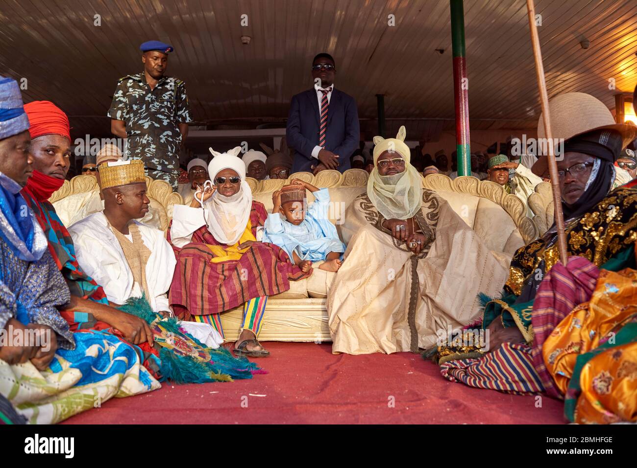 Emir of the city of Gumel with bodyguards and his entourage dressed in ...
