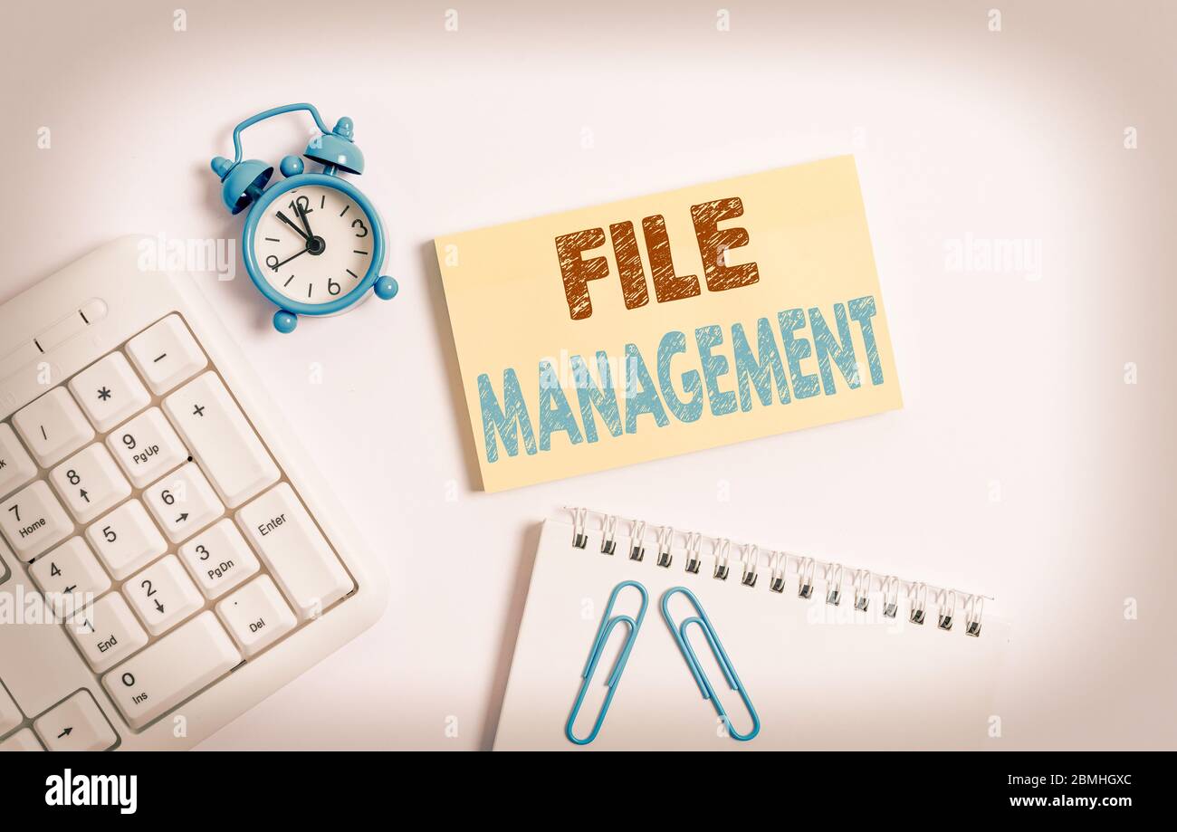 Writing note showing File Management. Business concept for computer ...