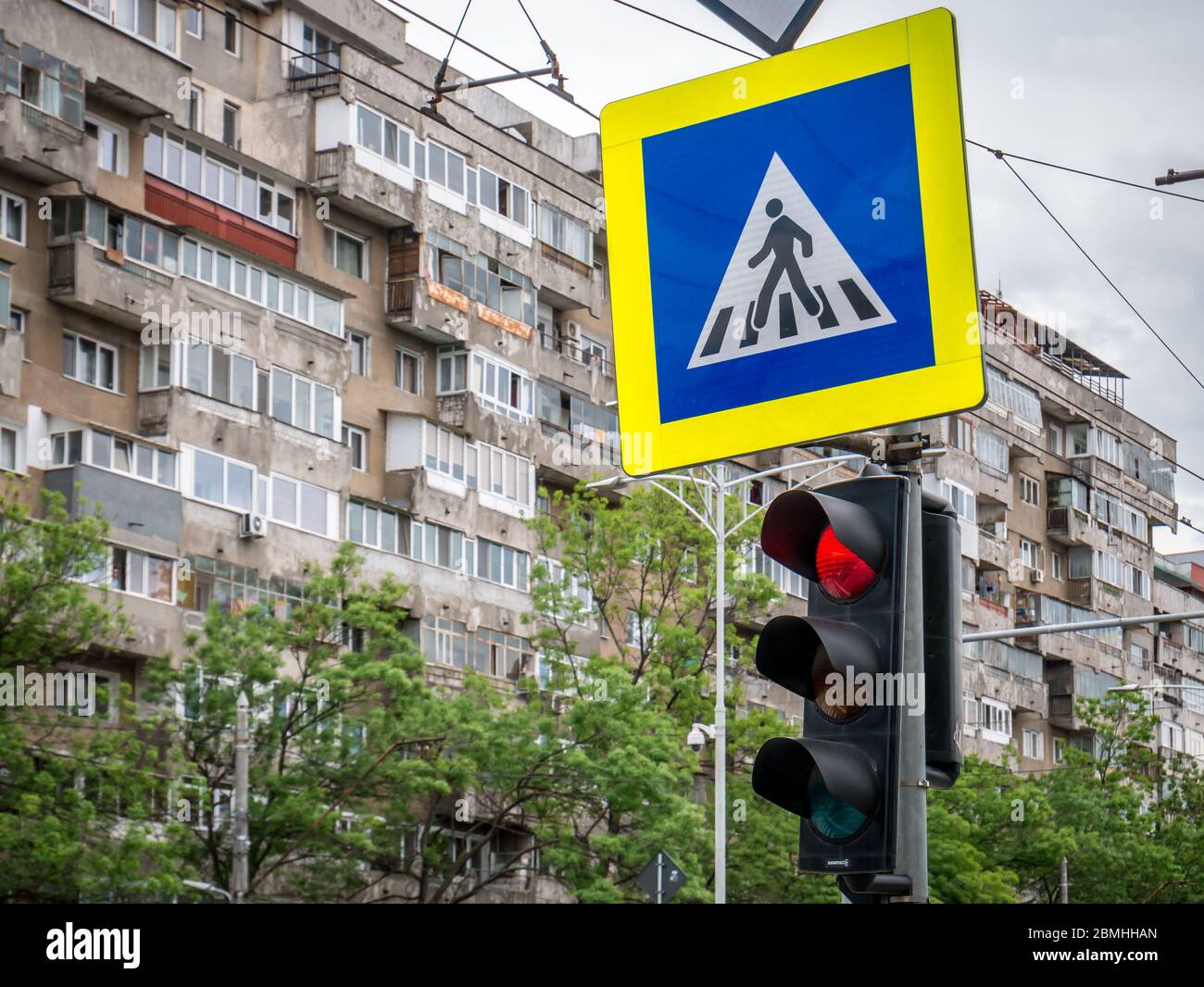 Zebra crossing sign and traffic light in Bucharest, . Red traffic light ...