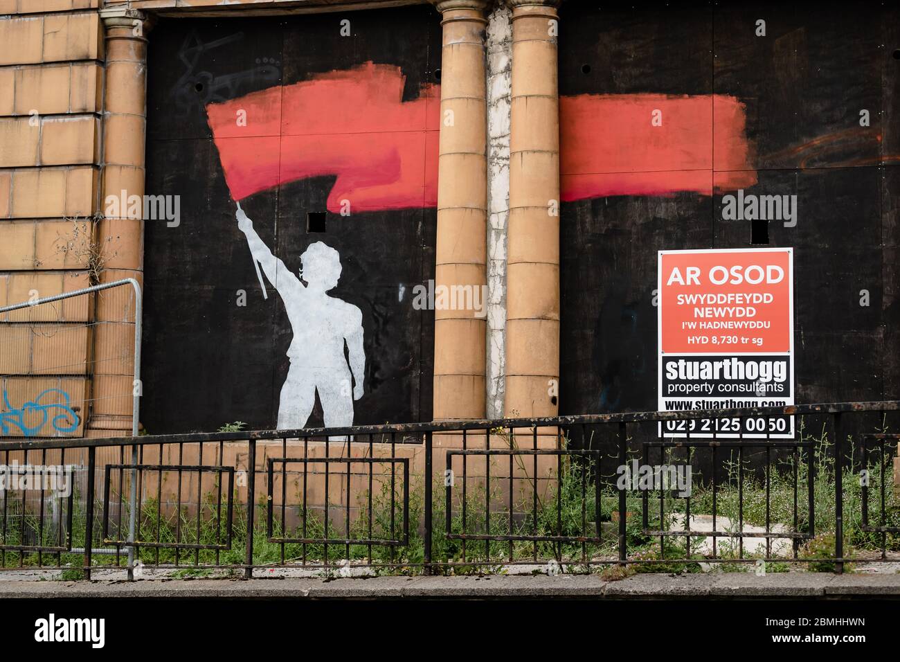 MERTHYR TYDFIL, WALES - 09 MAY 2020: Painted silhouette of a man waving ...