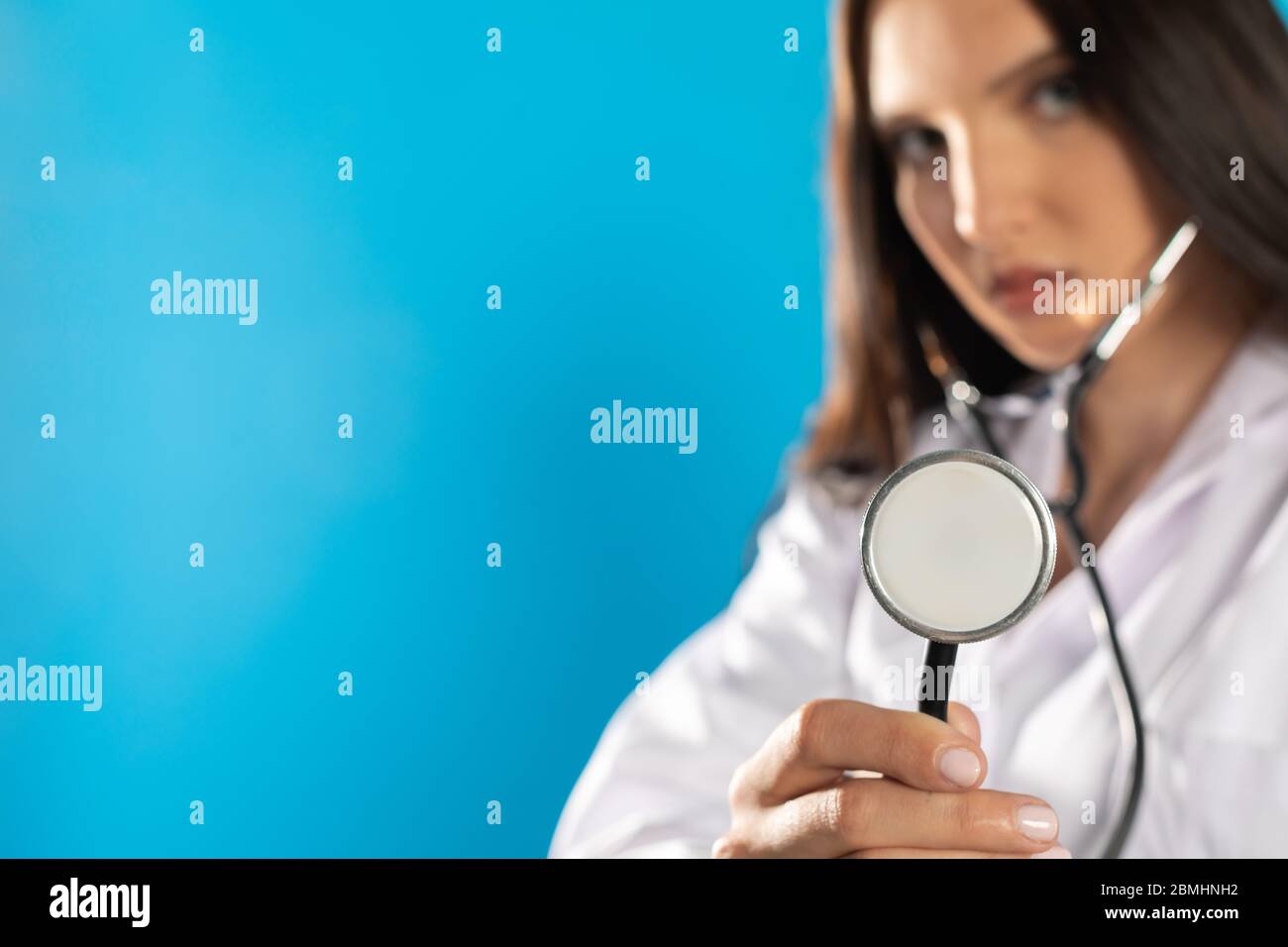 Stethoscope examination by a young lady at a pneumonology outpatient ...