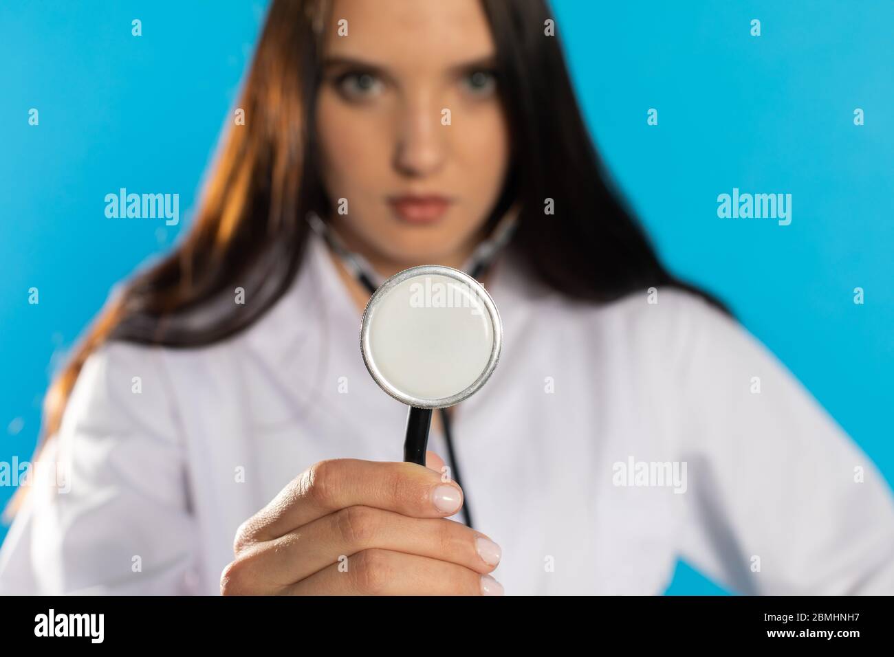 Stethoscope examination by a young lady at a pneumonology outpatient ...