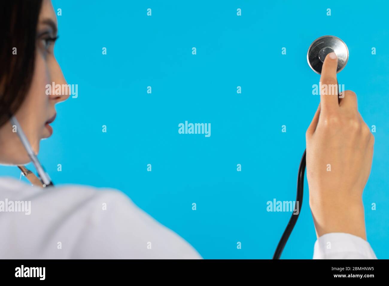 Stethoscope examination by a young lady at a pneumonology outpatient ...