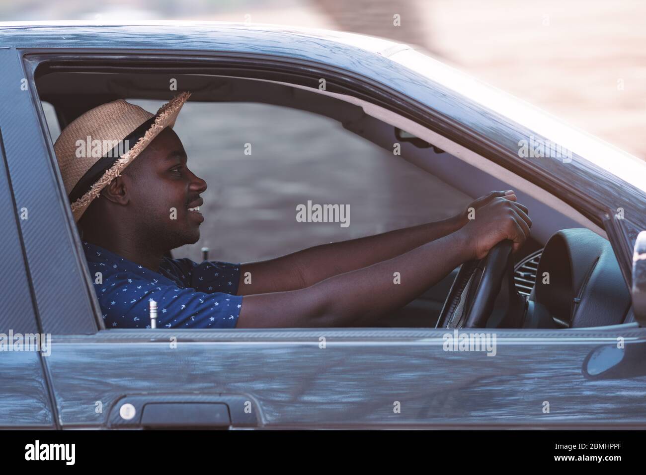 Happy african driver inside car hi-res stock photography and images - Alamy