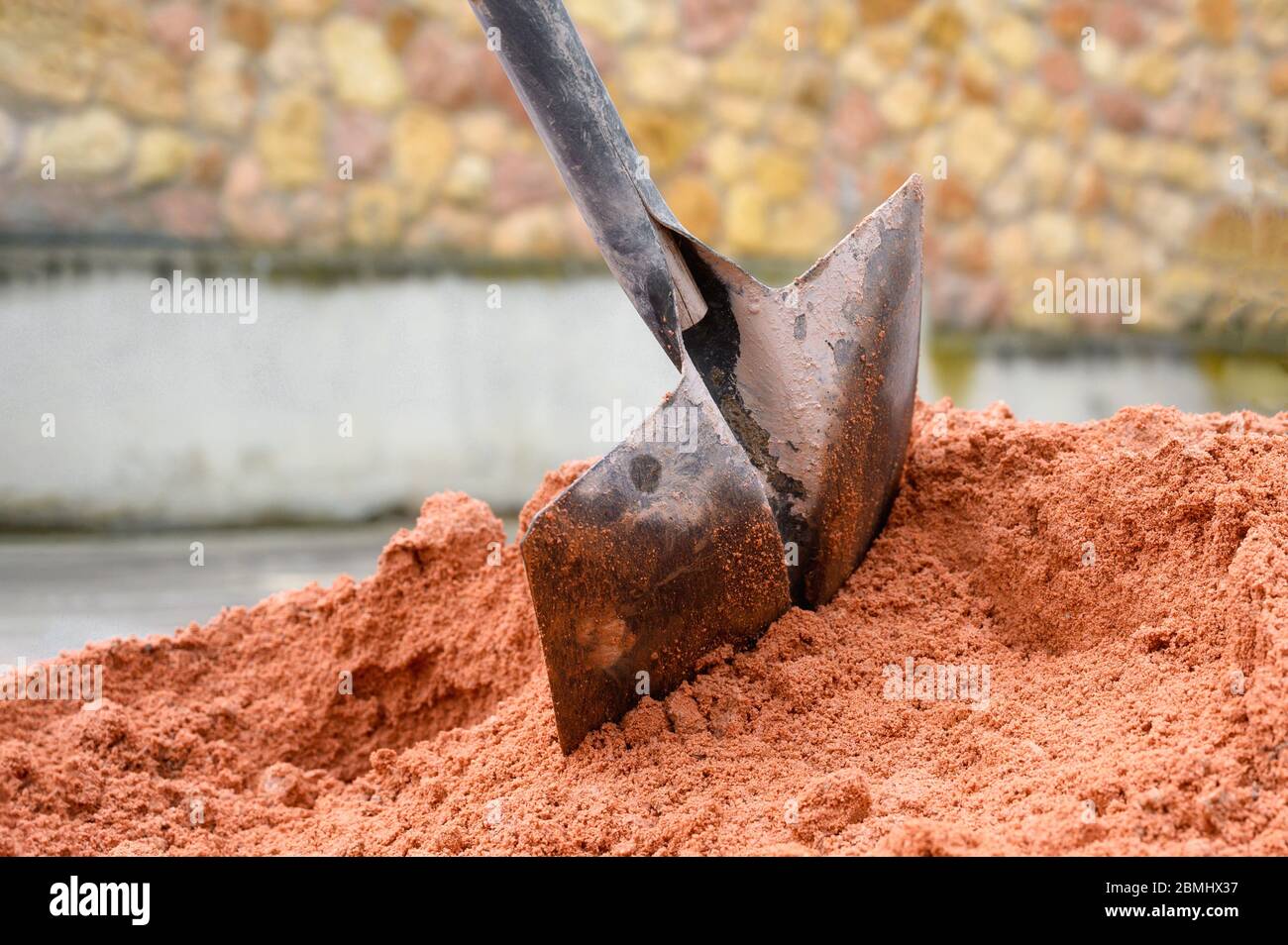 Pile Of Sand And Shovel For Construction Stock Photo - Alamy