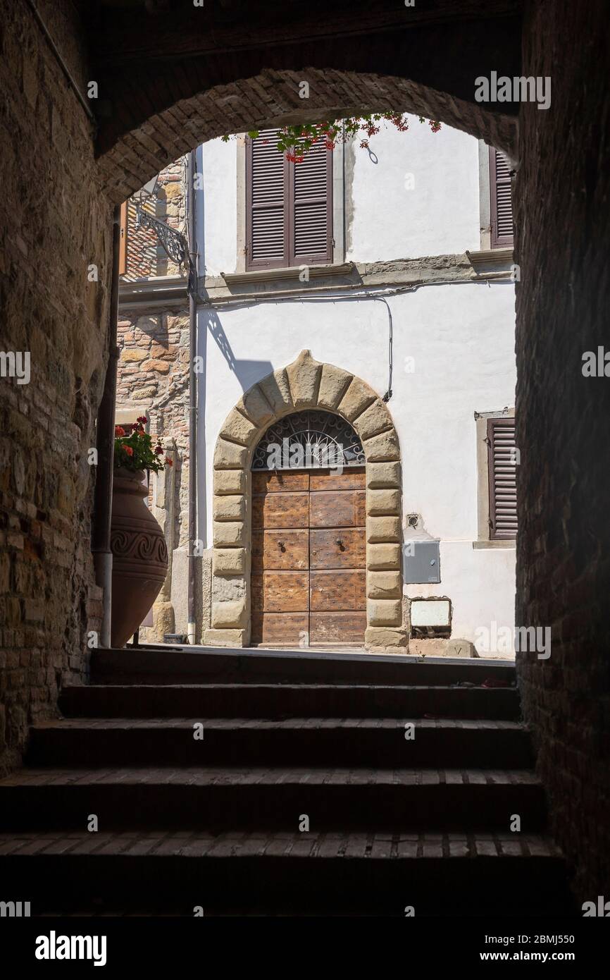 Old typical street of Citerna, historic village in Arezzo province ...