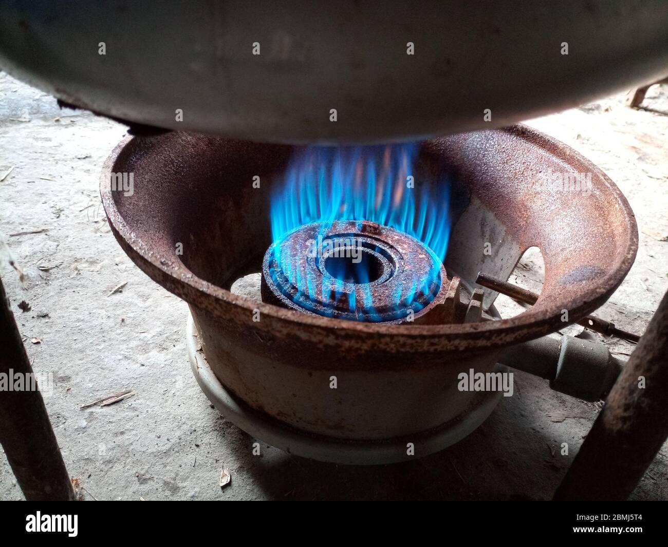 Work gas burner. Gas burner under the smokehouse tank Stock Photo - Alamy