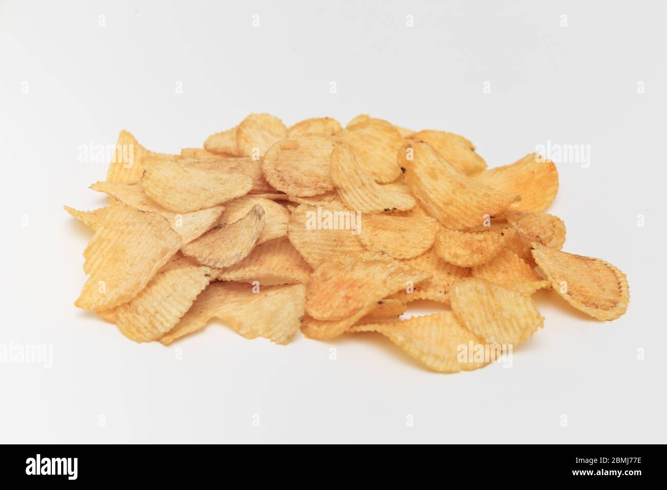 Slice of potato chips on a white background Stock Photo - Alamy