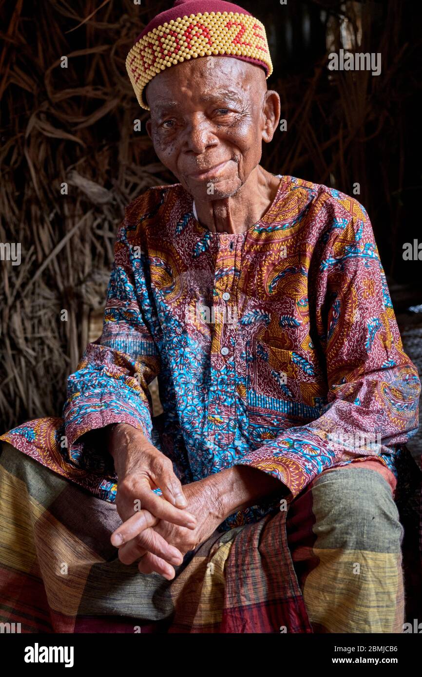 Portrait of an Edda elder dressed in a typical hat and suit Stock Photo ...