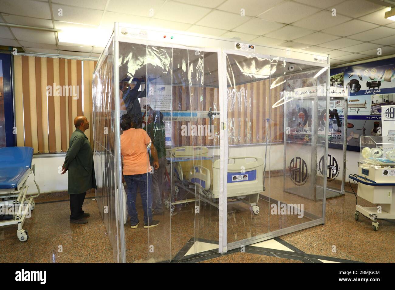 Cairo, Egypt. 4th May, 2020. Workers produce an isolation room in a ...