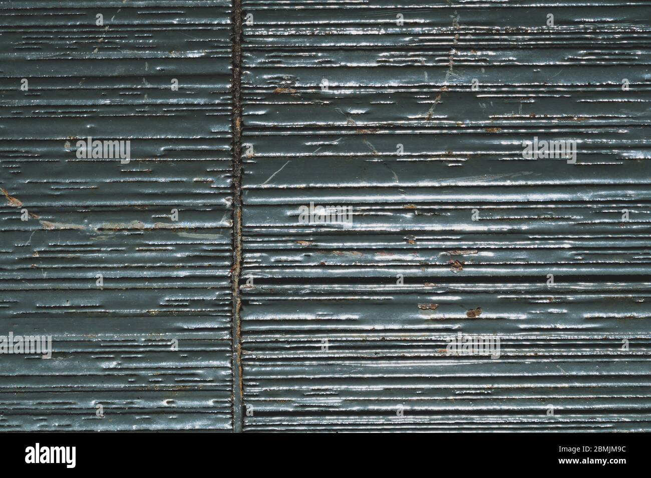 Industrial surface with cracks and scratches. metal plate coated with ...