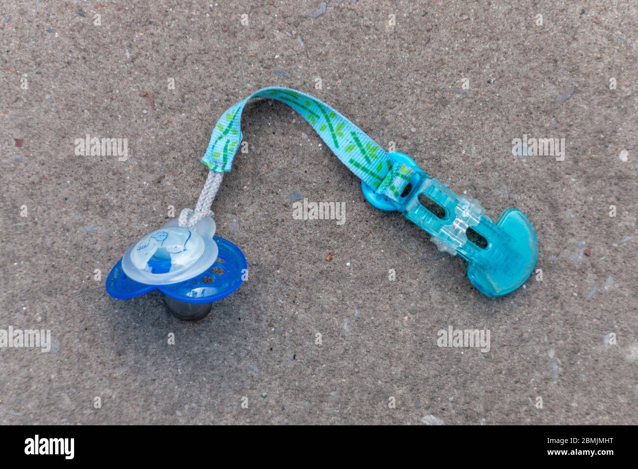 Bristol-May-2020-England- a close up view of a blue pacifier with clip ...
