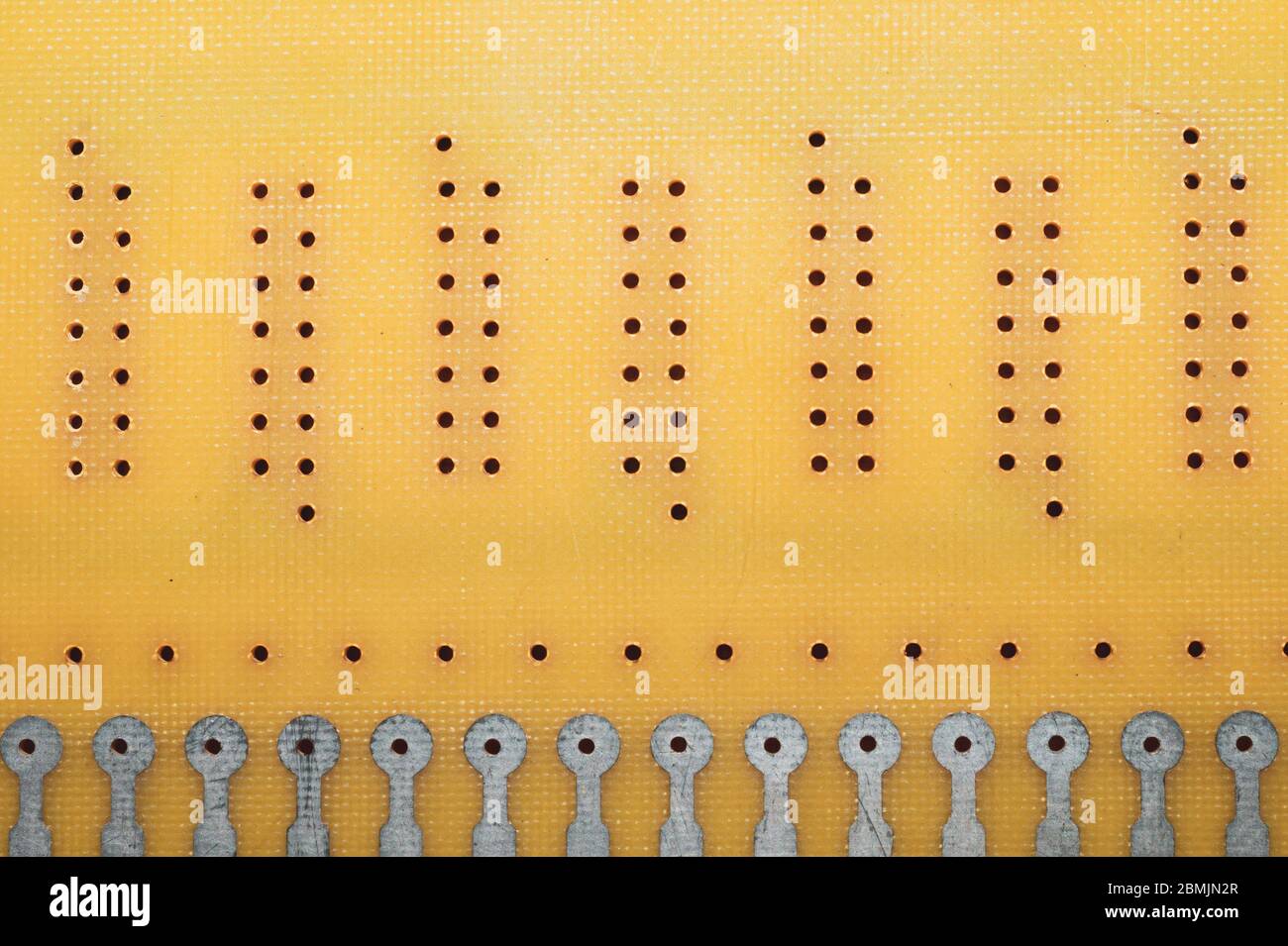 Dotted textolite surface. template for soldering the circuit ...