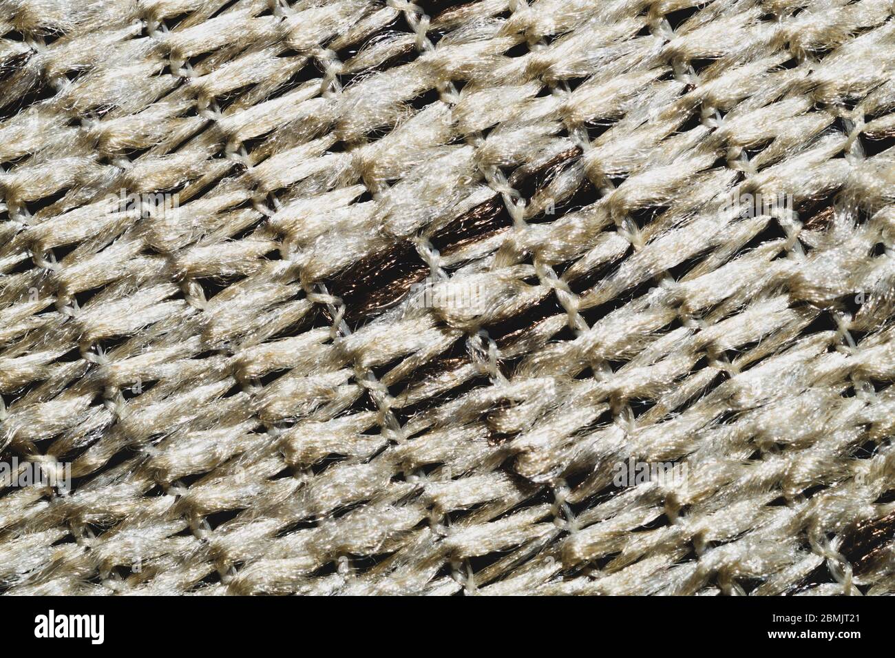 Braided fabric close up. woven texture. knitted material surface ...