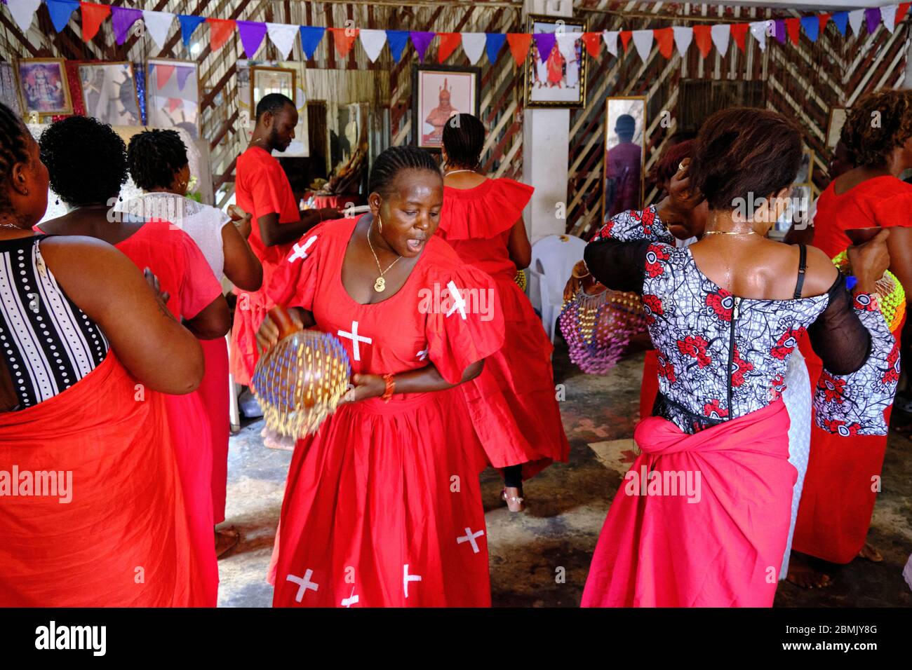 Women dancing during a ceremony in a temple dedicated to the Orisha ...