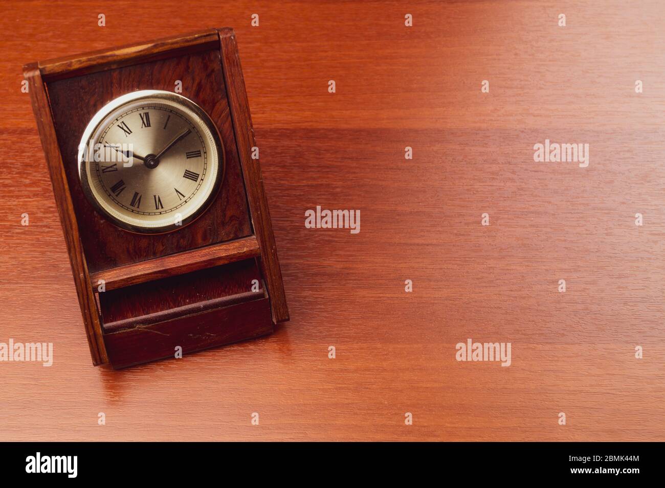 Retro wooden clock. square shaped vintage clock with round dial. wood ...