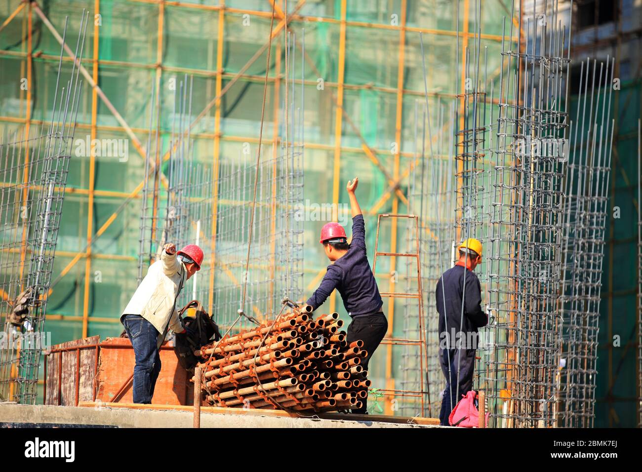 The construction workers are at work Stock Photo - Alamy