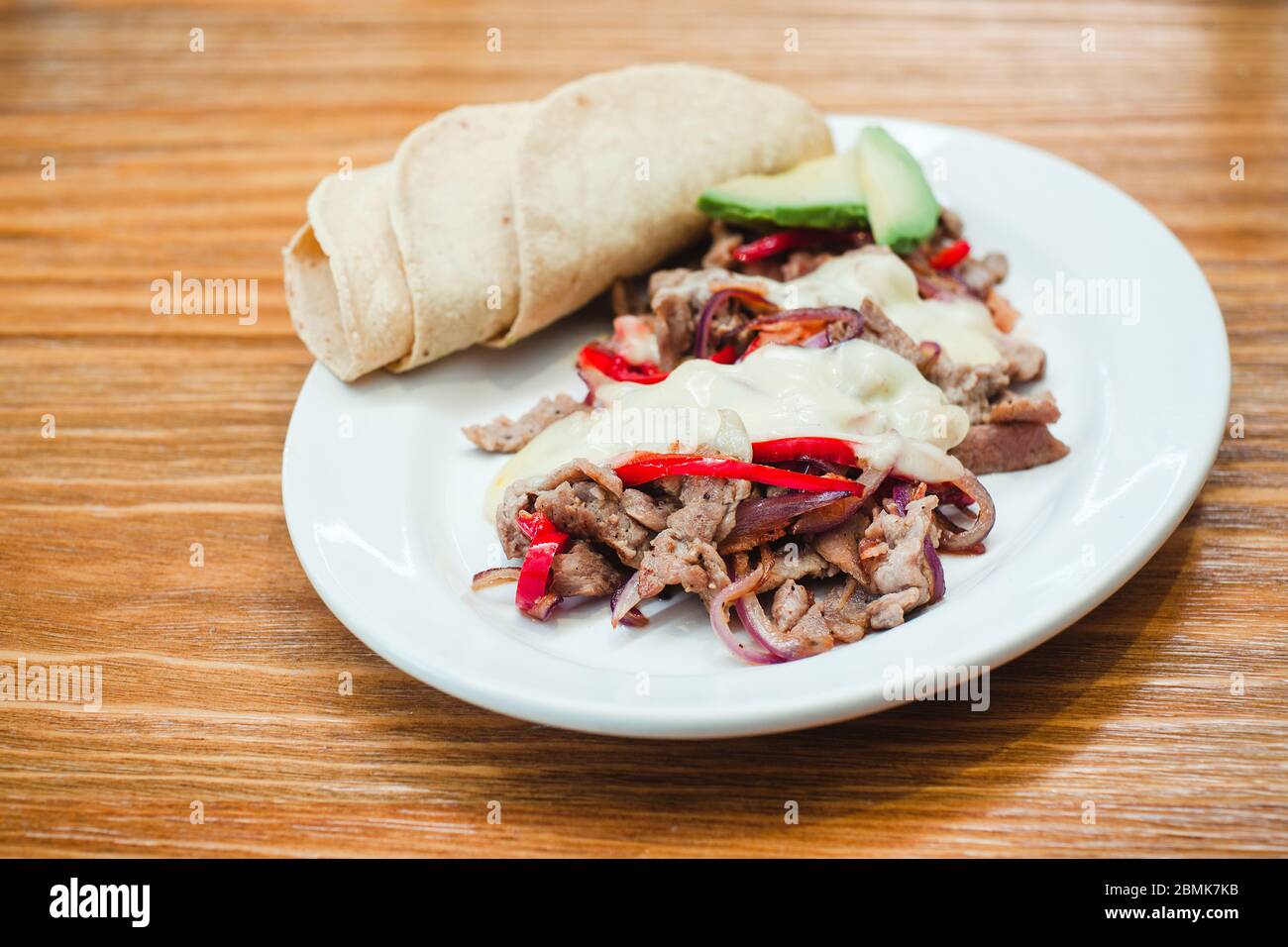 Mexican food, Alambre is made with Beef, onion, bacon, chili, cheese ...