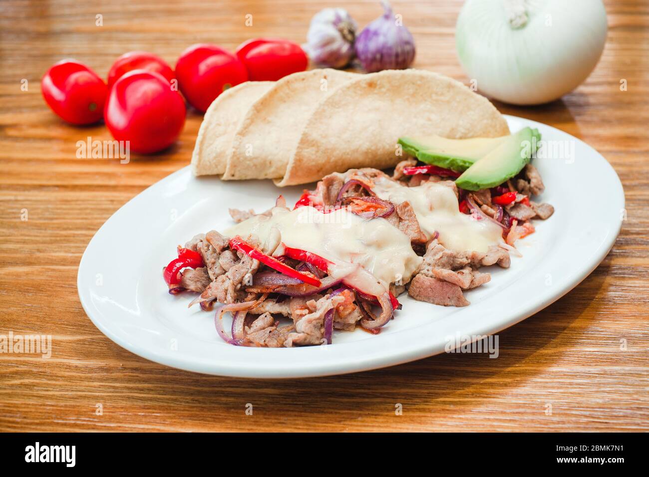 Mexican food, Alambre is made with Beef, onion, bacon, chili, cheese ...