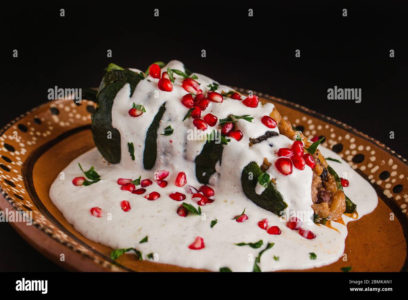 Chiles en Nogada, traditional Mexican cuisine in Puebla Mexico Stock ...