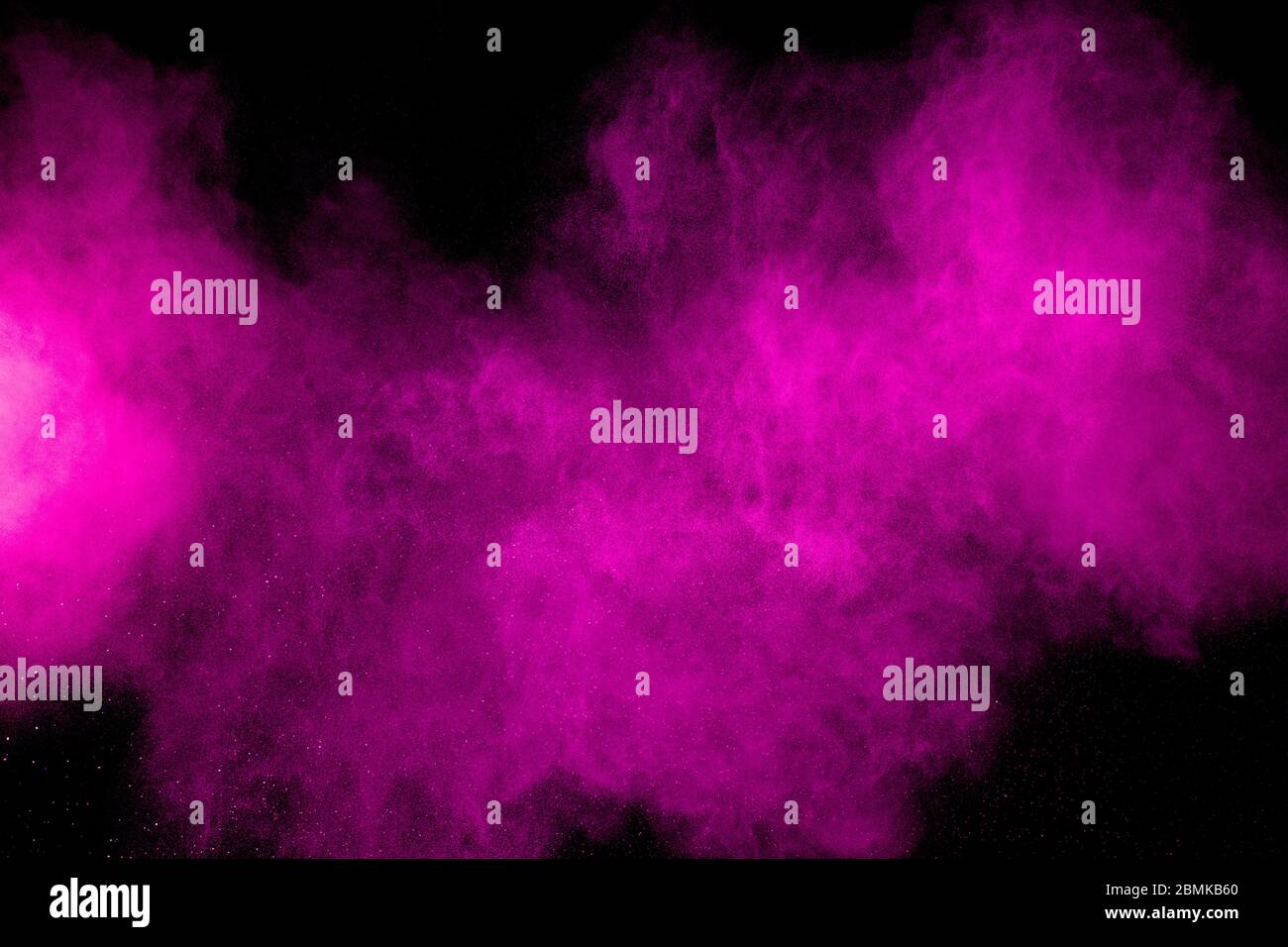 Pink dust particles splash on black background.Pink powder splash Stock ...