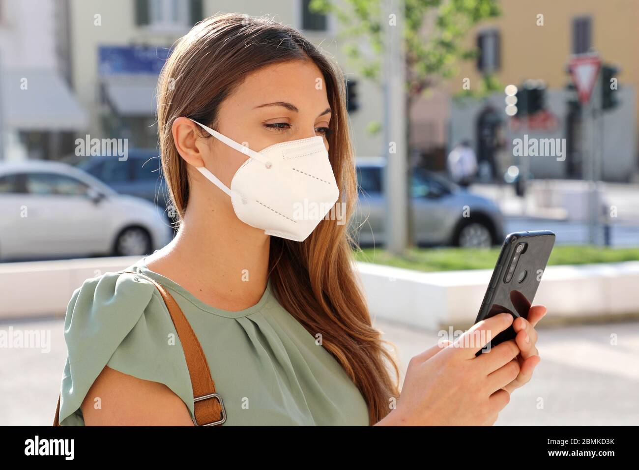 COVID-19 Mobile Application Young Woman Wearing KN95 FFP2 Mask Using ...