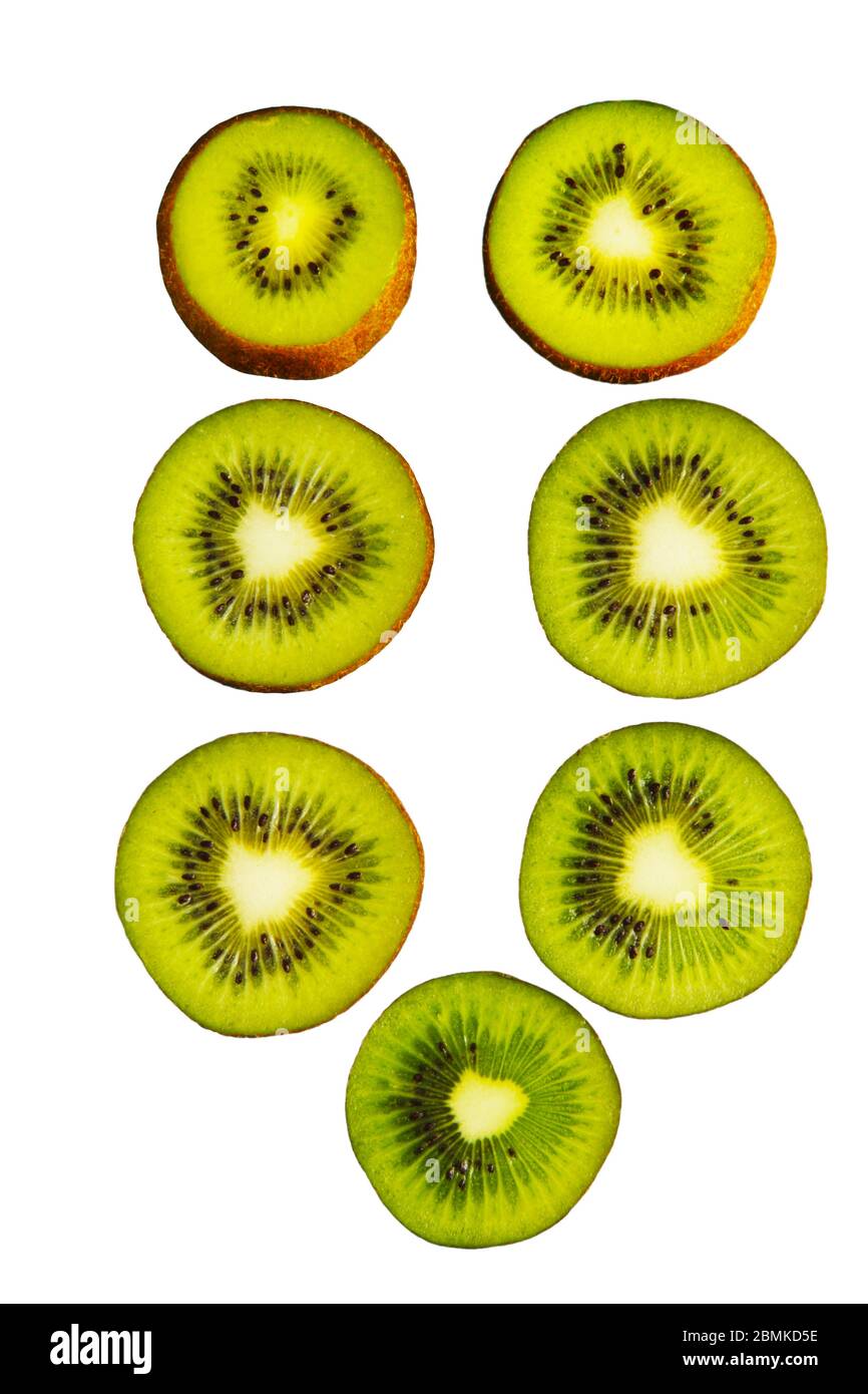 Set of slices of juicy green kiwi fruit isolated on white background ...