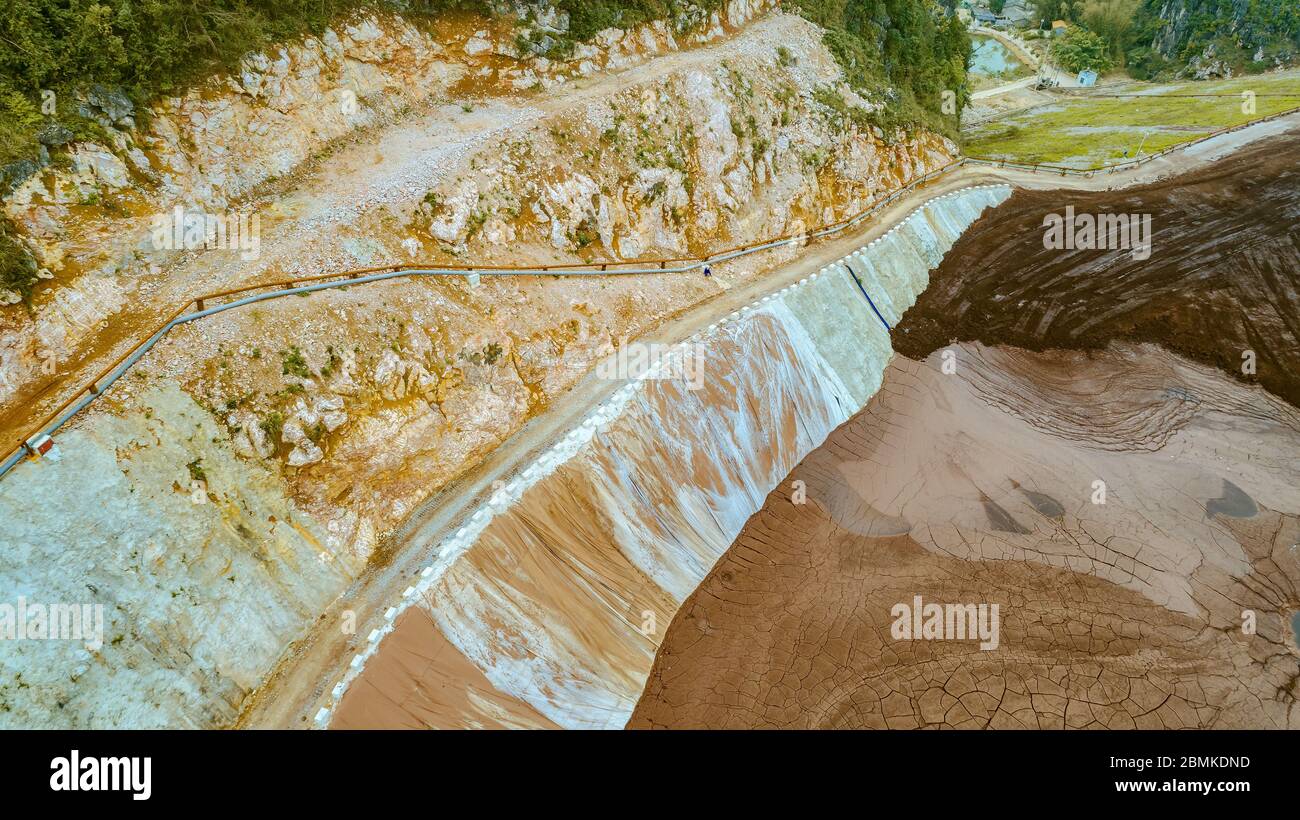 Aerial View of Tailing Ponds with rubble road Stock Photo - Alamy