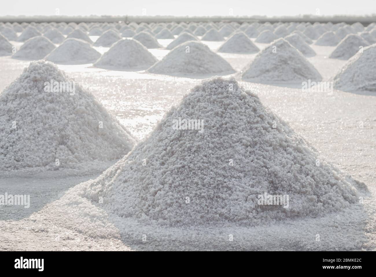 Sea salt pile pyramid made from evaporation of seawater and ready for ...