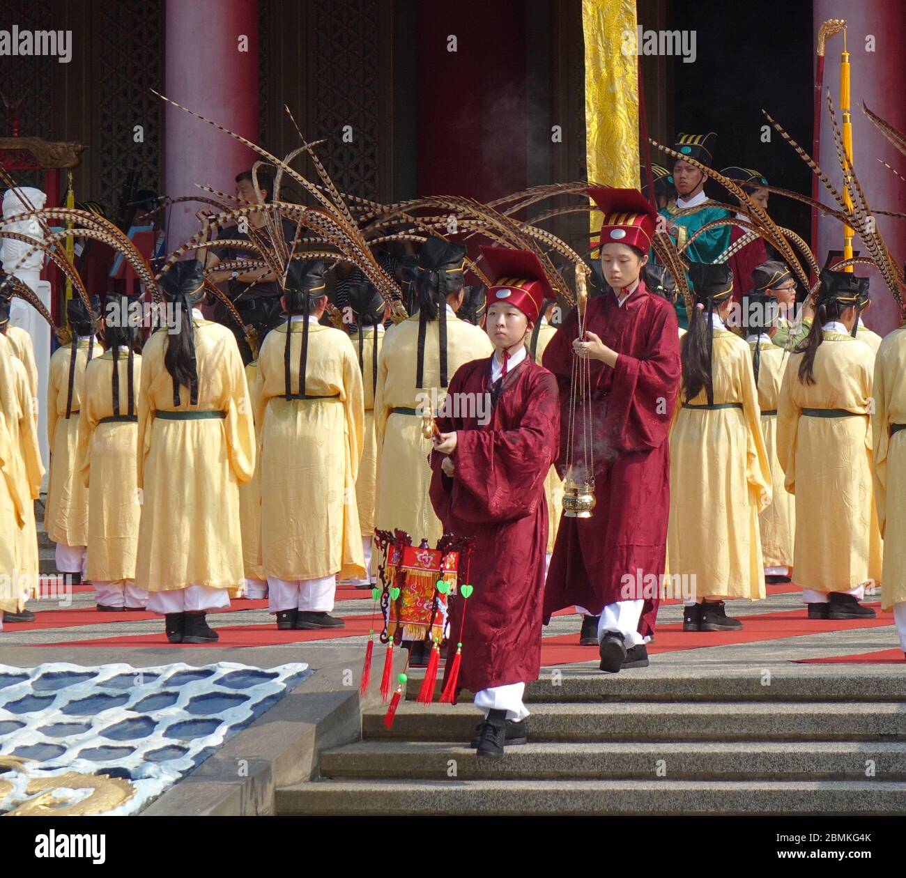 KAOHSIUNG, TAIWAN -- SEPTEMBER 28 , 2017: Ceremonial attendants in red ...