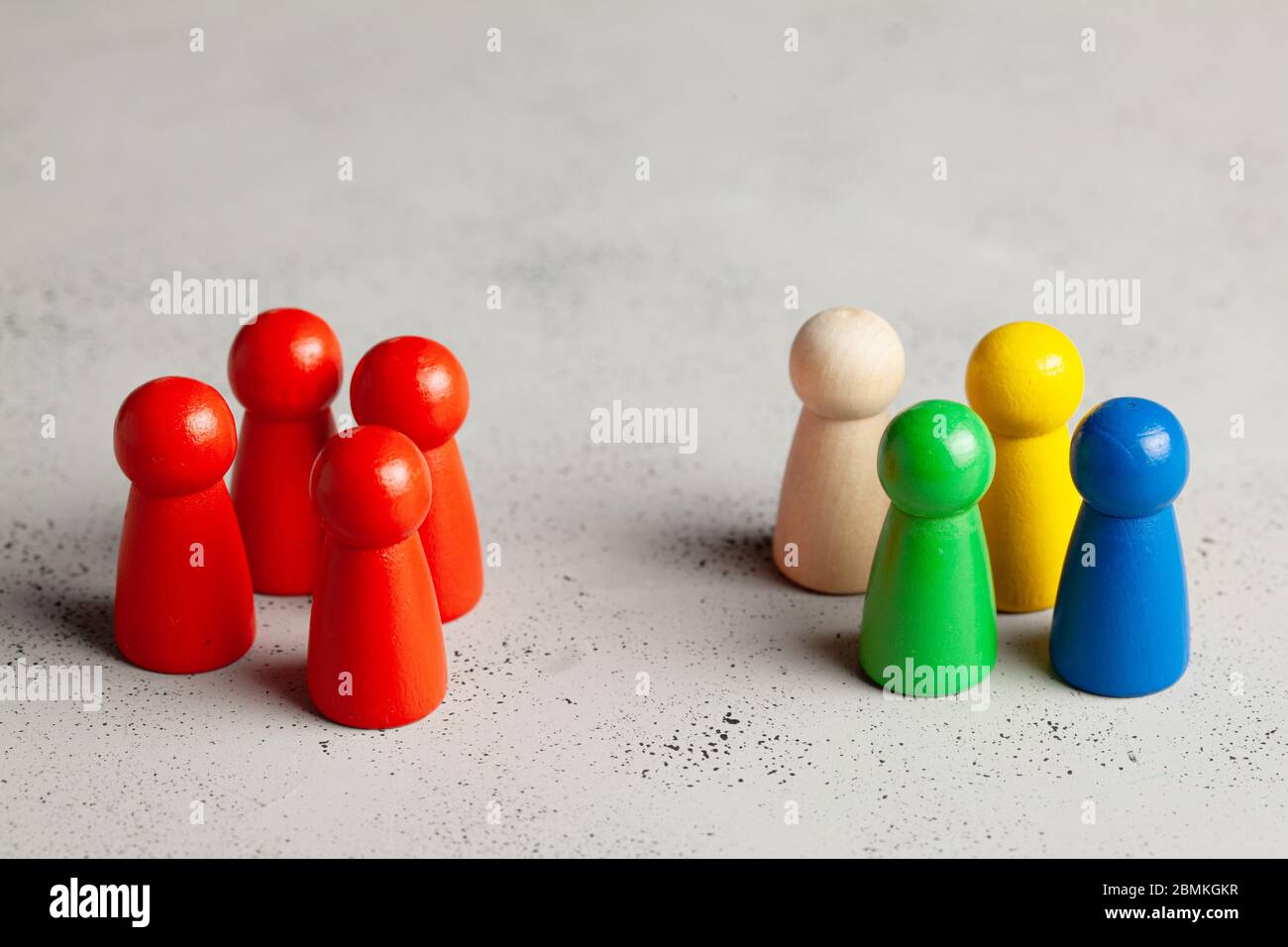 Two business teams. Red and colored group of employees Stock Photo - Alamy