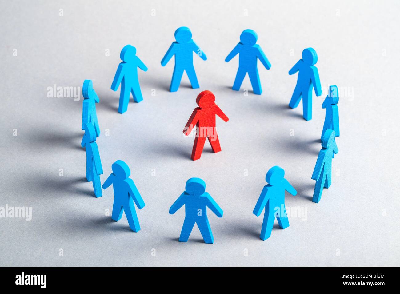 Team Leader. HR. The right choice of staff. Blue men and red leader ...