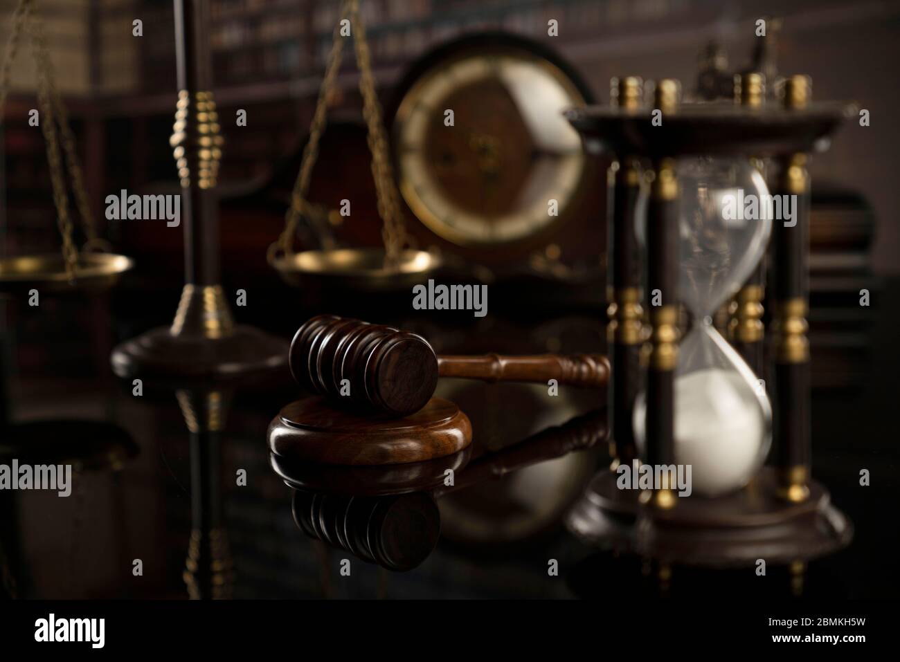 Lawyers office concept. Law symbols composition: gavel, scale on brown ...