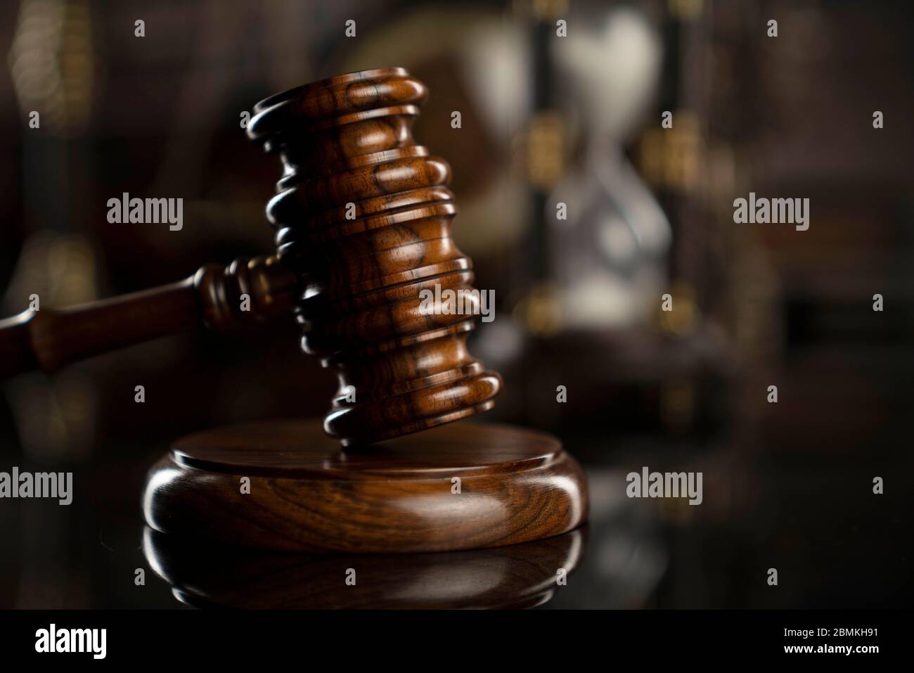 Lawyers office concept. Law symbols composition: gavel, scale on brown ...