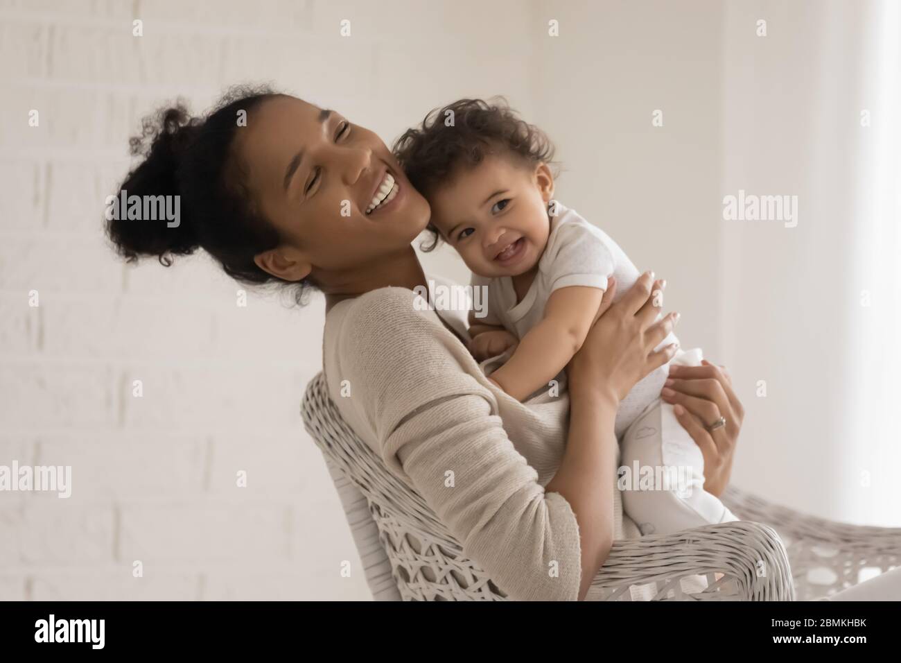Mom cuddle hi-res stock photography and images - Alamy